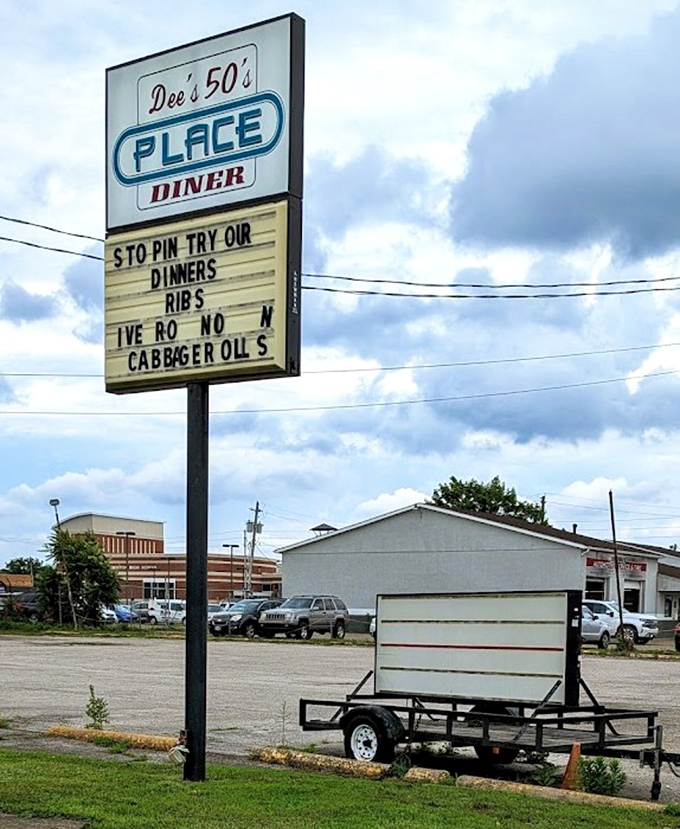 That roadside sign isn't just announcing a restaurant—it's a beacon of hope for hungry travelers seeking authentic diner magic.