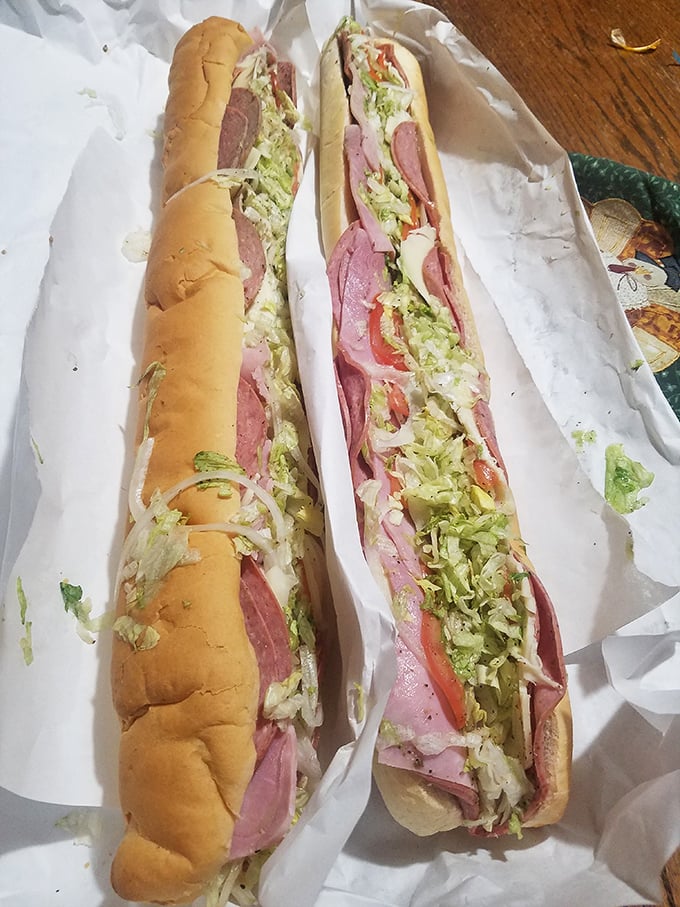 The super battleship stretches toward the horizon like an edible bridge connecting hunger to satisfaction—this isn't a meal, it's a two-day food commitment.