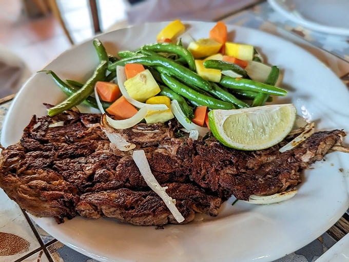 Vaca frita – "fried cow" sounds so much better in Spanish – delivers crispy, tender beef alongside vegetables that aren't just sidekicks but worthy companions.