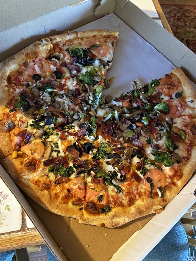 The "kitchen sink" approach to pizza toppings done right. Vegetables make it healthy, bacon makes it irresistible.