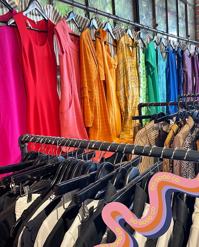 A rainbow of garments organized by color creates an Instagram-worthy display that makes shopping feel like a joyful treasure hunt.