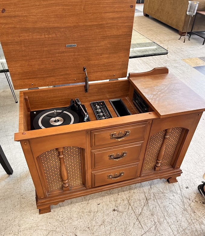 The holy grail of thrift finds! This vintage stereo console represents the pinnacle of 1970s entertainment technology – complete with turntable for your vinyl revival.