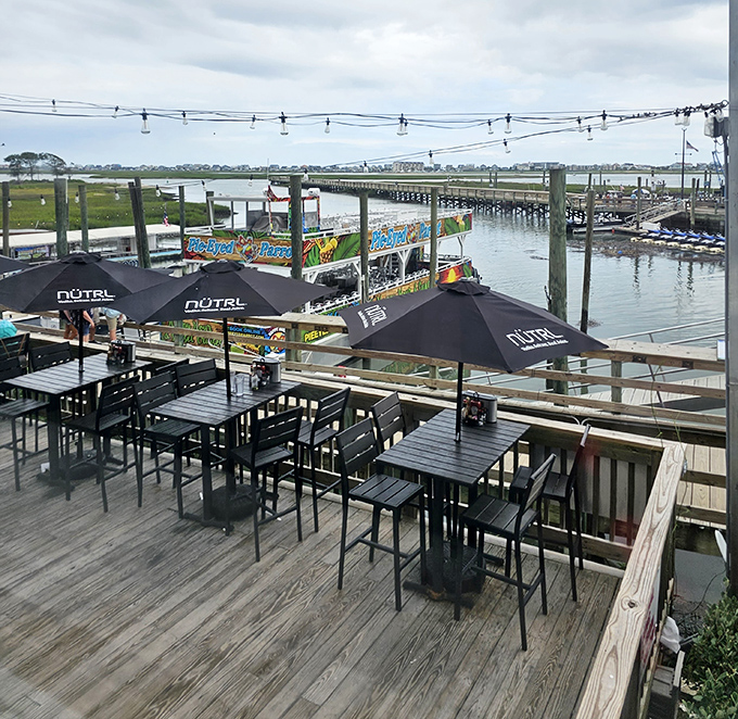 Waterfront dining with a view of the inlet and docks—where the journey from boat to plate is measured in yards, not miles.