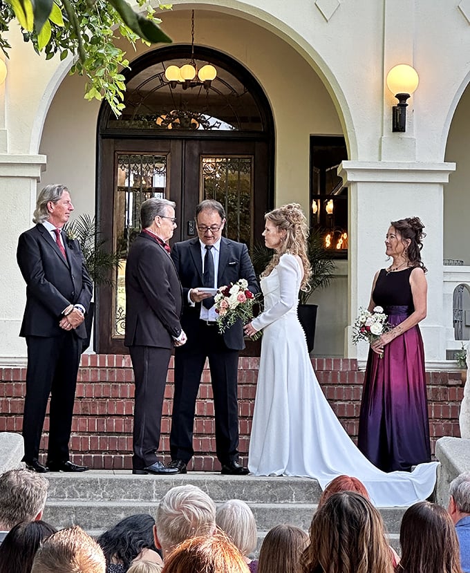 The castle steps transform into an altar where "I do" comes with a side of architectural splendor and California sunshine.