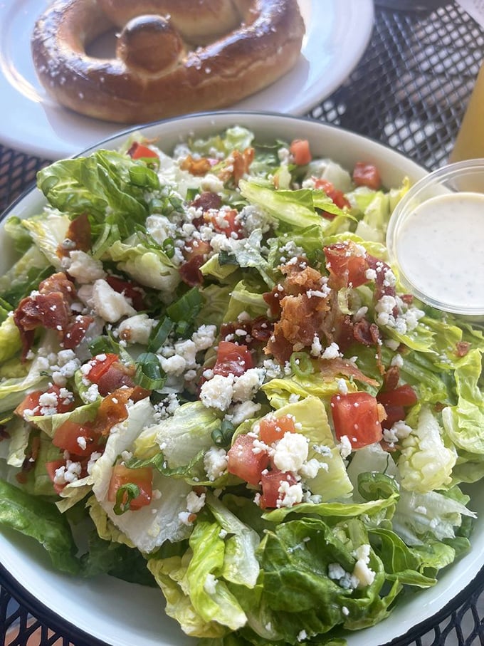 A salad that doesn't apologize for being a salad—crisp, colorful, and crowned with enough bacon and cheese to earn respect.