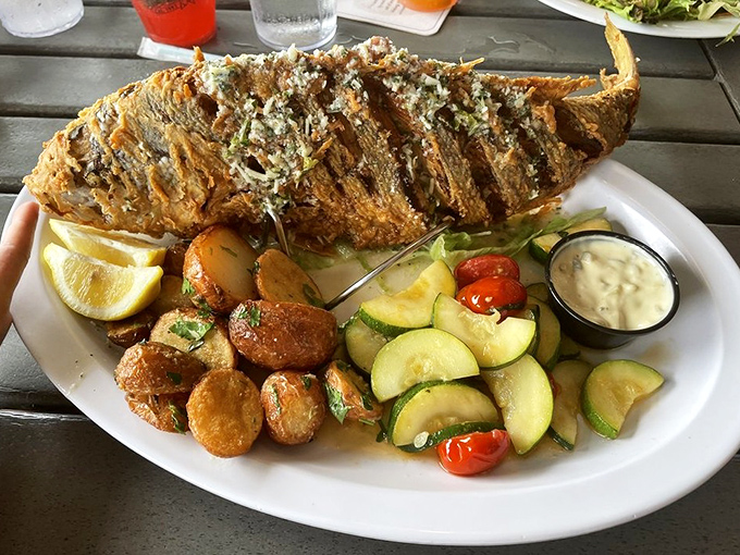When they say "whole fried fish," they're not kidding – this yellow tail arrived ready for its glamour shot.