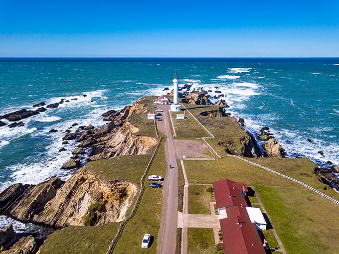 From above, the peninsula reveals its dramatic position – a finger of land pointing into the Pacific, daring the ocean to do its worst. 