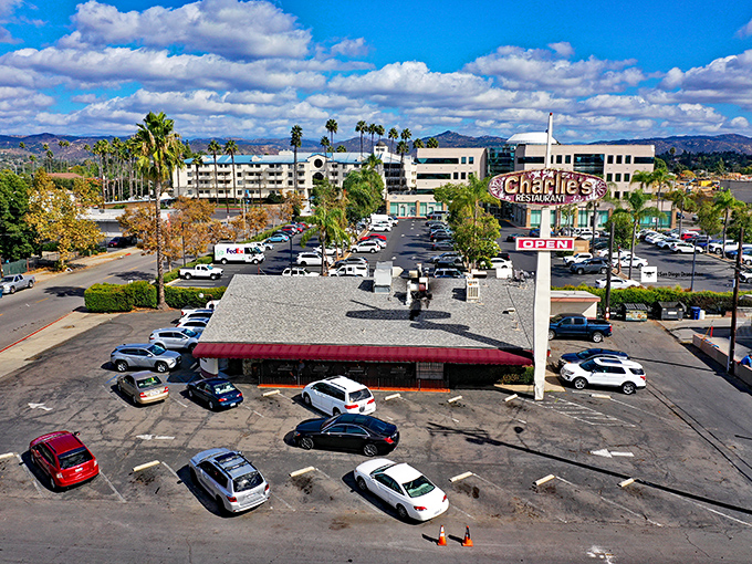 From above, Charlie's looks unassuming – but locals know this parking lot fills up faster than a waffle soaks up syrup.