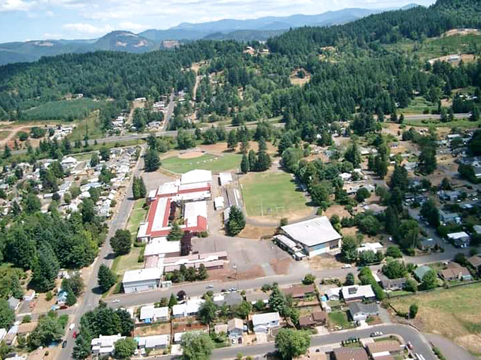 From above, Cottage Grove reveals its perfect nestling among forested hills. A human-scale town where nature didn't get the memo about staying away.