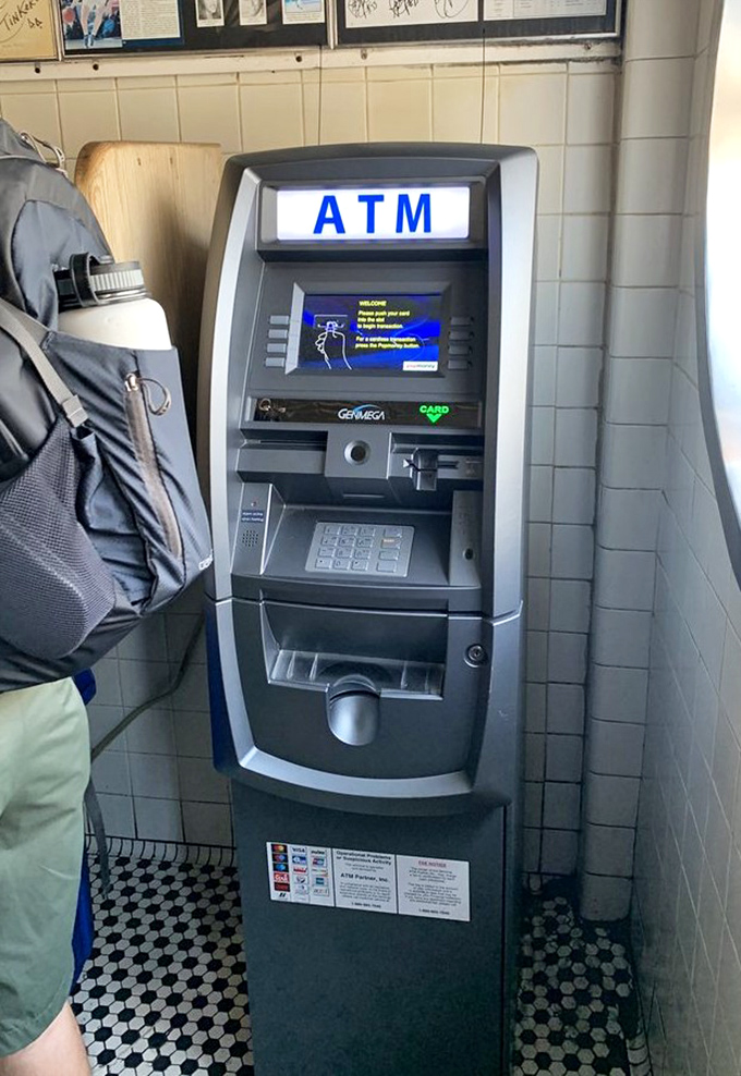 Even the ATM corner has character—because at Jim's, you'll want cash ready for that impulse second sandwich you're definitely going to order.