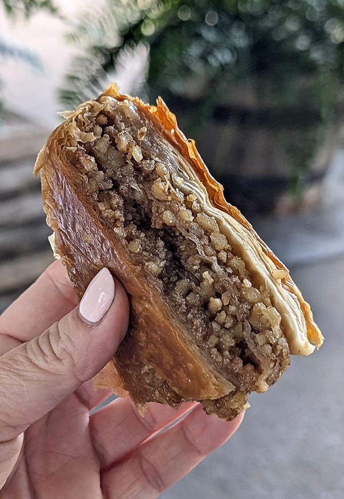 Behold the cross-section of perfection—flaky pastry embracing a nutty filling that would make any Eastern European grandmother nod in approval. Sweet, savory, sublime.