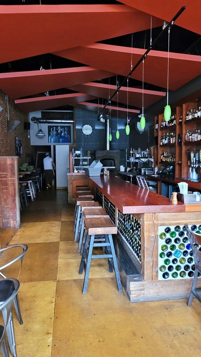The bar where magic happens – where bottles line up like soldiers ready to enhance your meal with liquid companionship.