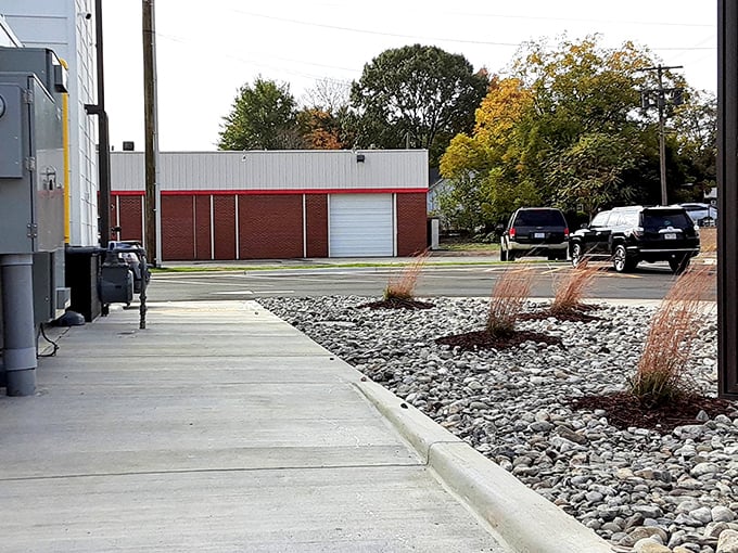 The thoughtful landscaping and clean exterior maintain Biscuitville's commitment to creating a welcoming environment, even before you taste the food.