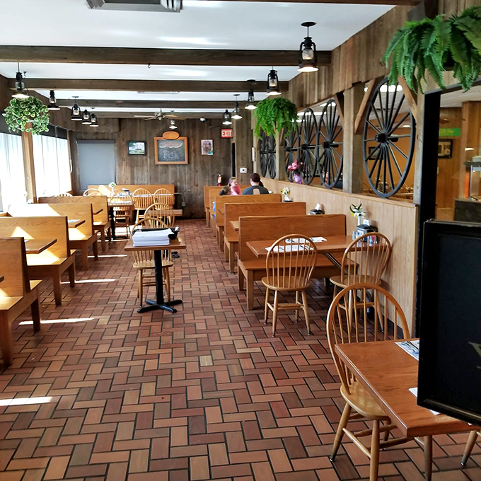 Wagon wheel décor and wooden booths create an atmosphere that says, "Sit down, stay awhile, and yes, you should definitely order dessert."