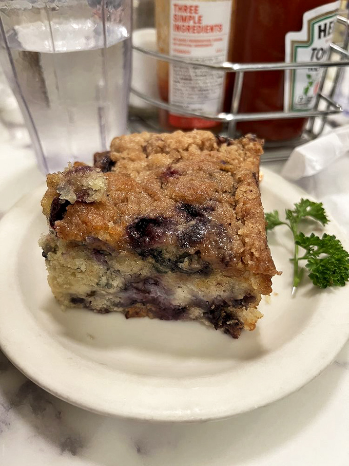 This isn't just coffee cake—it's the reason people linger at the table long after the plates are cleared, negotiating for "just one more bite" with surprising intensity.