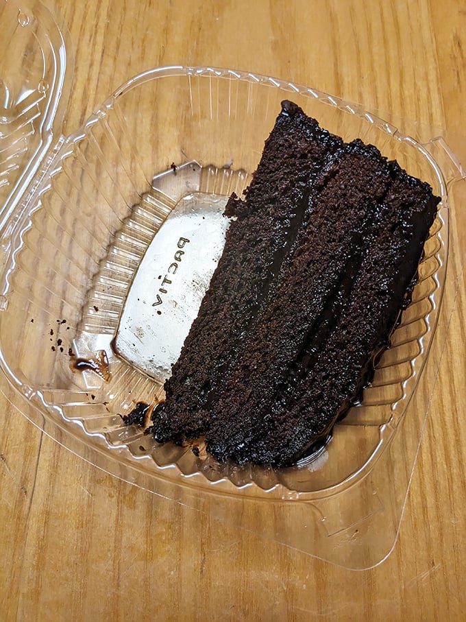 Chocolate cake so rich and decadent it deserves its own tax bracket. The perfect finale to a sandwich pilgrimage.