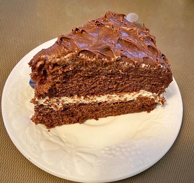 Plot twist! Beyond seafood excellence lurks this chocolate layer cake – rich, decadent, and the perfect sweet finale to a savory seafood symphony.