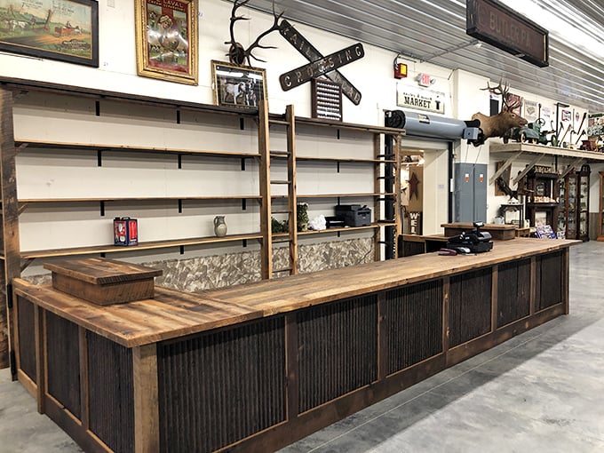 This isn't just a counter—it's command central for treasure hunting operations, backed by empty shelves waiting to showcase the next batch of historical gems.