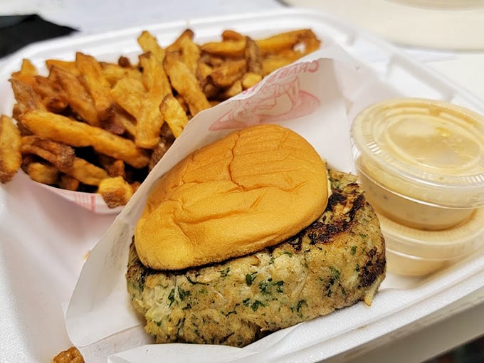 The ultimate handheld happiness: their famous crab cake dressed simply with a bun. Proof that greatness doesn't require complicated presentation.