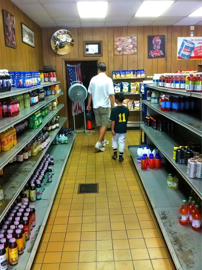 The timeless scene of a parent and child walking the snack aisle—creating memories one sandwich shop visit at a time.