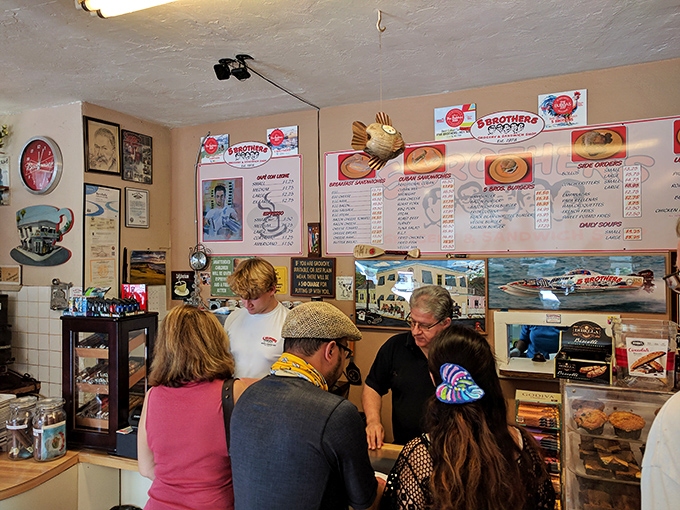 The morning crowd at 5 Brothers isn't just waiting for food; they're participating in a Key West ritual—where locals and savvy visitors converge for Cuban coffee communion.