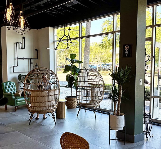 Wicker egg chairs create private breakfast sanctuaries by sun-drenched windows – the breakfast equivalent of first-class seating in Kissimmee.