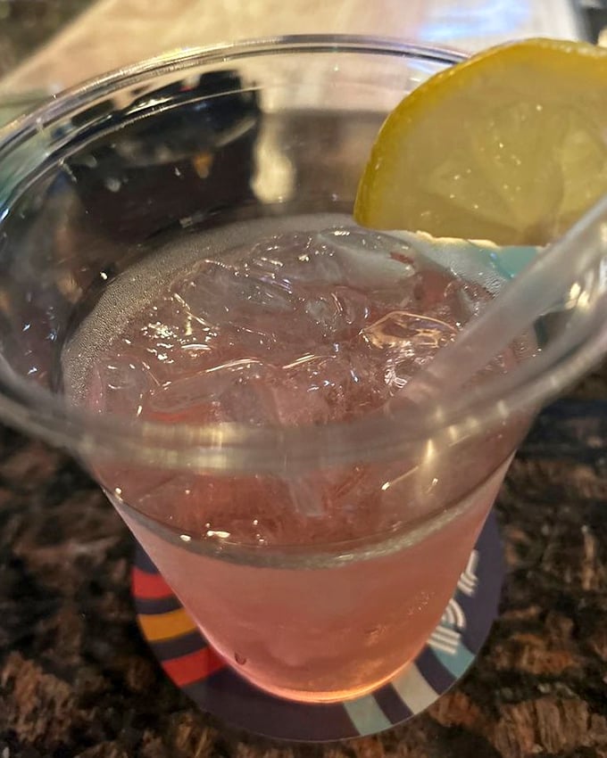 The perfect companion to a serious sandwich session. A cold, refreshing drink with a lemon twist—because hydration matters when tackling Tony G's menu.