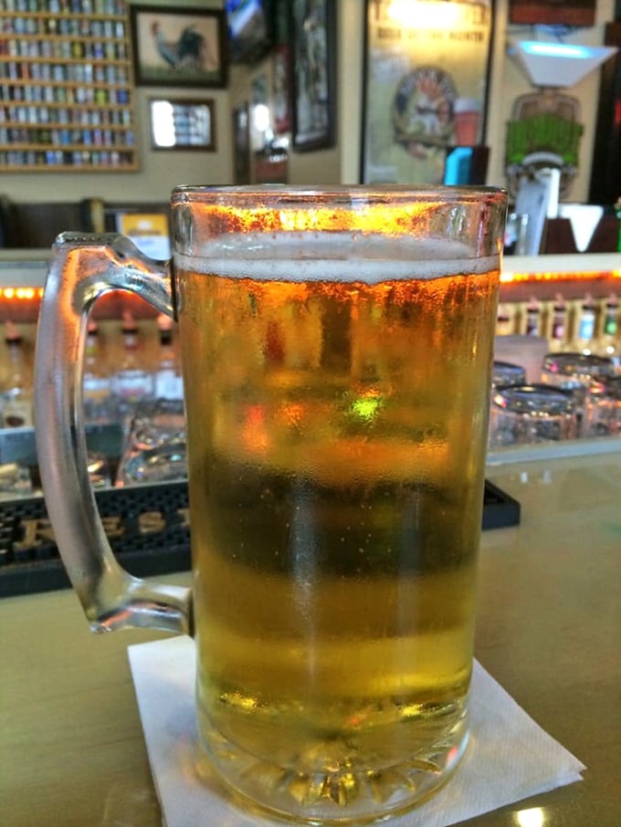 A frosty mug of golden beer catching the light just right—because sometimes the perfect burger companion isn't another person, but a well-crafted brew.