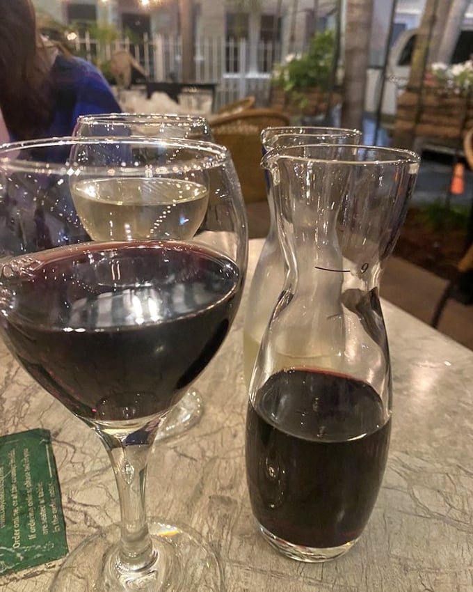 Wine in proper glassware even on the patio? That's how you know this place respects your need for civilization with your pizza.