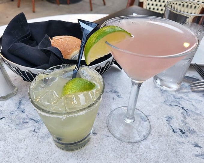 Cocktails that Don Draper would order without hesitation. That margarita and cosmopolitan aren't just drinks—they're liquid preludes to a memorable evening.