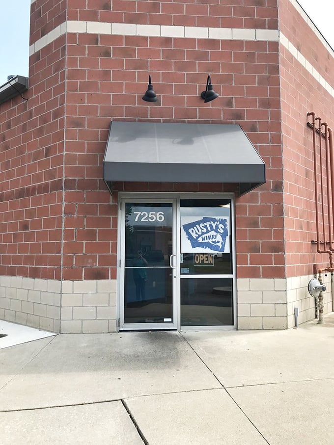 No fancy frills needed when the food speaks for itself—just a simple entrance marking the threshold between ordinary day and extraordinary meal.