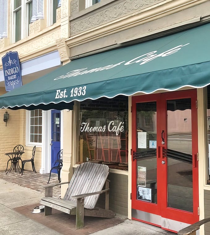 The perfect storefront doesn't exi— Oh wait, here it is! Thomas Café's classic façade promises timeless flavors and zero pretension inside.