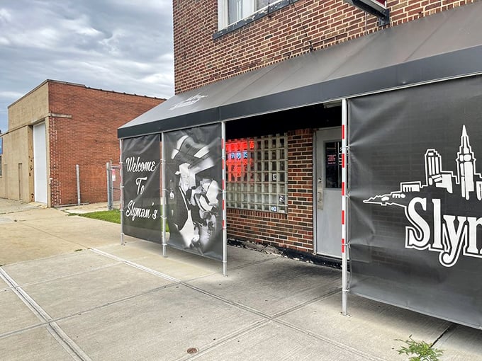 The entrance to Slyman's promises Cleveland's skyline and sandwich satisfaction. Not all heroes wear capes—some wear aprons and stack corned beef.