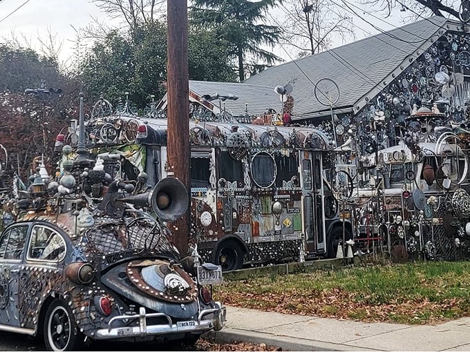 From this angle, you can appreciate the full madness of the metal menagerie. That's not a house—it's a three-dimensional manifesto.