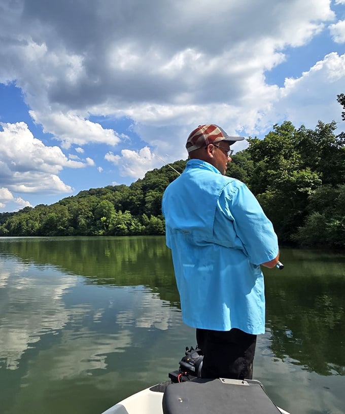 The patient fisherman knows what office workers forget—sometimes the greatest productivity comes from standing still.