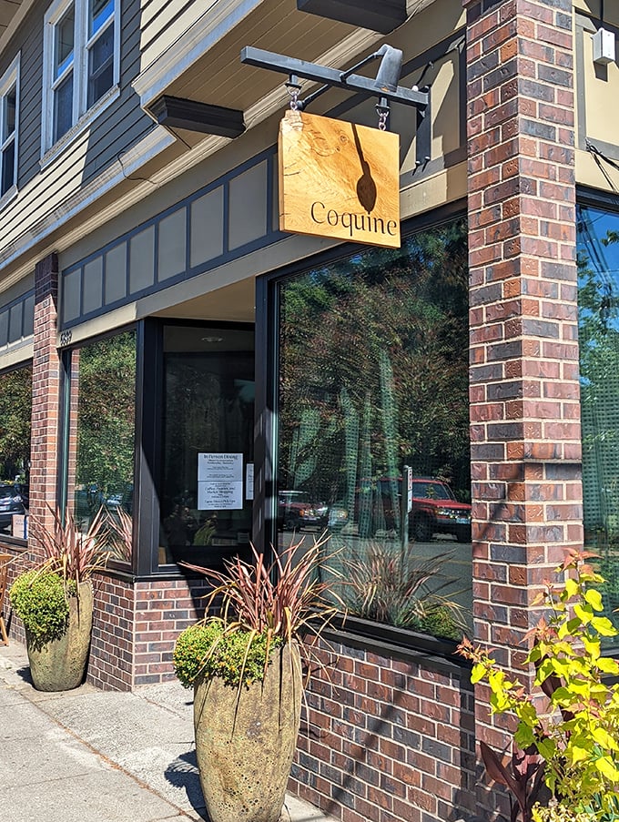 The wooden sign swinging gently above the entrance—a beacon for food lovers. Like finding the door to Narnia, but with better dining options.