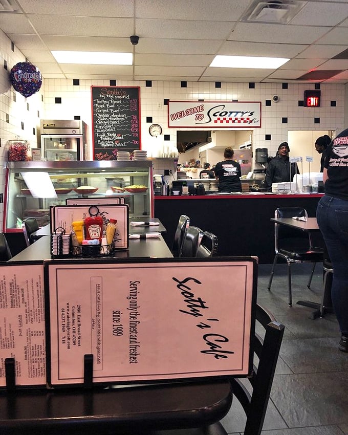 Where the magic happens—Scotty's kitchen and counter. The welcome sign says it all: this is a place that wants you to feel at home.