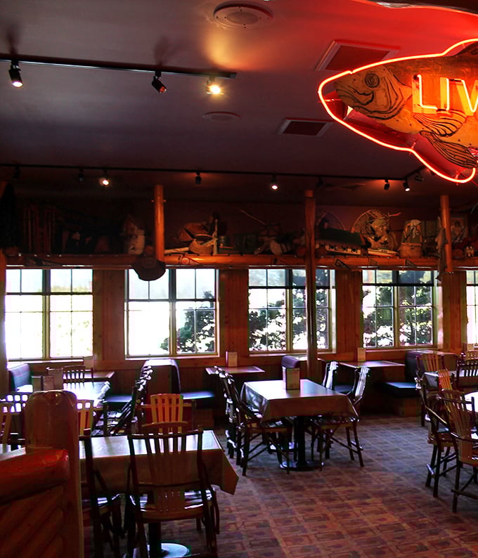 Warm wood tones and neon accents create a dining atmosphere that's both nostalgic and inviting—the perfect setting for memorable meals.