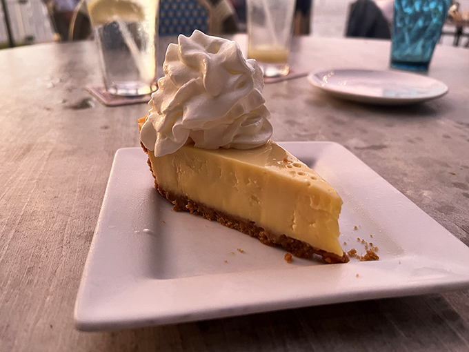 Key lime pie that strikes the perfect balance between sweet and tart—the kind that makes you consider ordering a second slice "for the road."