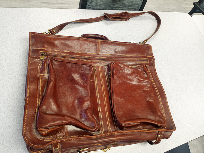 This well-loved leather messenger bag has stories to tell—and plenty of room for the chapters you'll add to its journey.