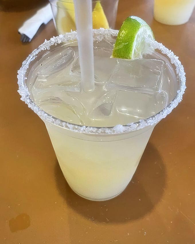 A perfectly salted margarita rim meets tart-sweet refreshment—the ideal companion for battling spicy seafood and summer heat.