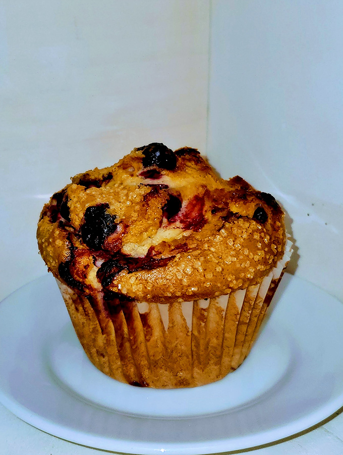 This berry muffin isn't just Instagram-worthy—it's the kind of honest baking that reminds you why homemade will always beat mass-produced.