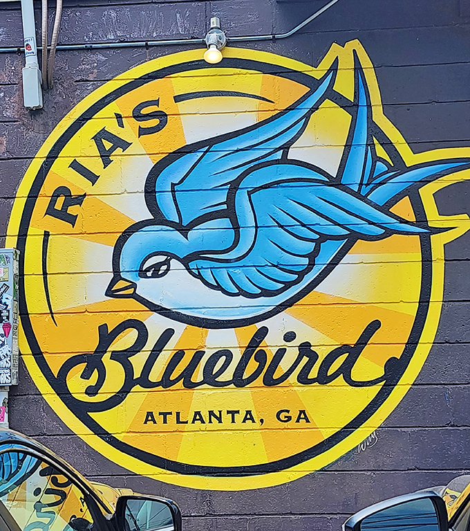 That vibrant bluebird mural isn't just a logo—it's a beacon of breakfast hope for hungry Atlantans seeking something beyond the ordinary.