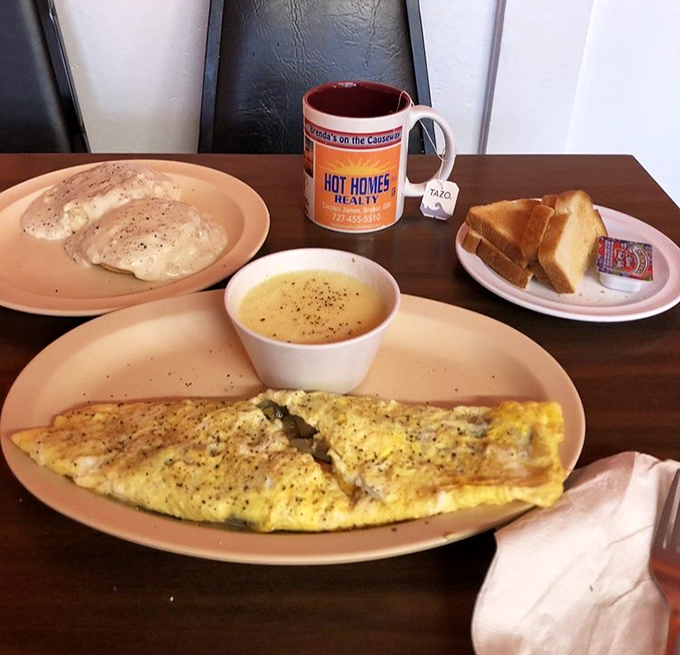 An omelet so generously stuffed, it's practically daring you to finish it – challenge accepted.