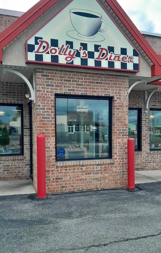 The welcoming entrance with its iconic sign promises what every good diner should: comfort, community, and coffee that keeps coming.