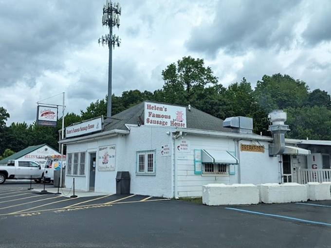 From this angle, you can almost smell the sausage cooking inside—the white building practically glows with breakfast potential.