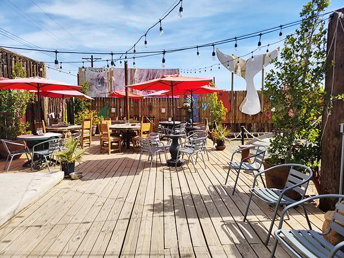 String lights sway in the gentle desert breeze above the outdoor patio—a perfect stage for conversations that last until dawn.