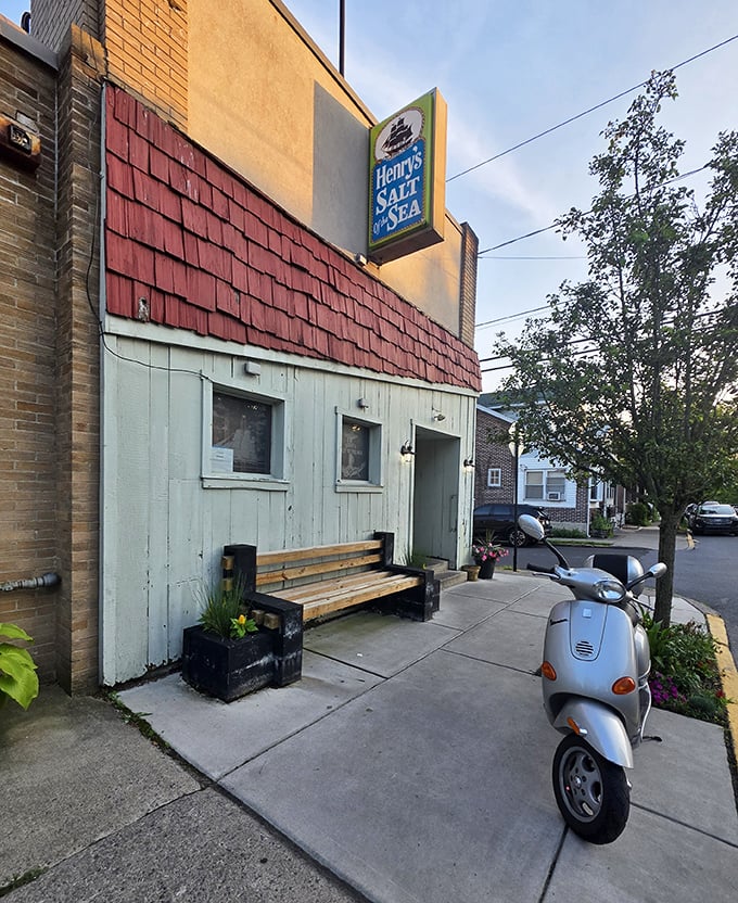 The humble bench outside offers a moment of anticipation—the calm before the delicious storm that awaits inside.