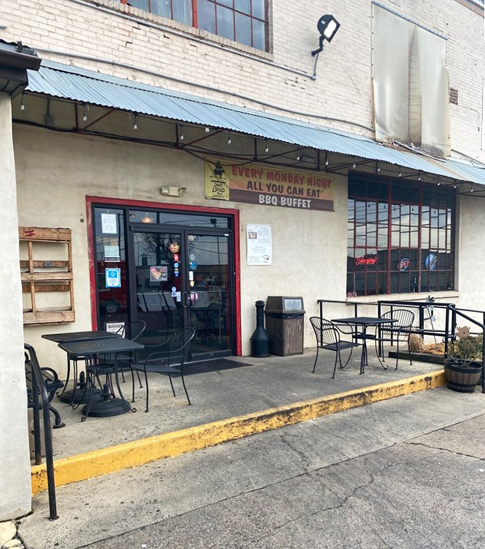 The modest patio entrance announces an "All You Can Eat BBQ Buffet"—six words that could make a grown person weep with joy.