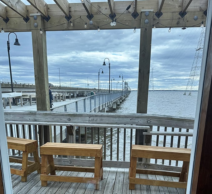 Outdoor seating that turns lunch into an event. The bridge stretching into the distance reminds you how small we are—better order dessert.